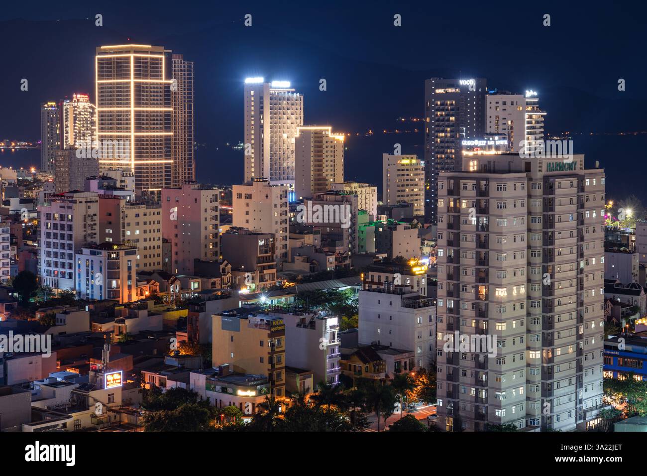 Night view of Da Nang high rise apartments and hotel buildings near the ...