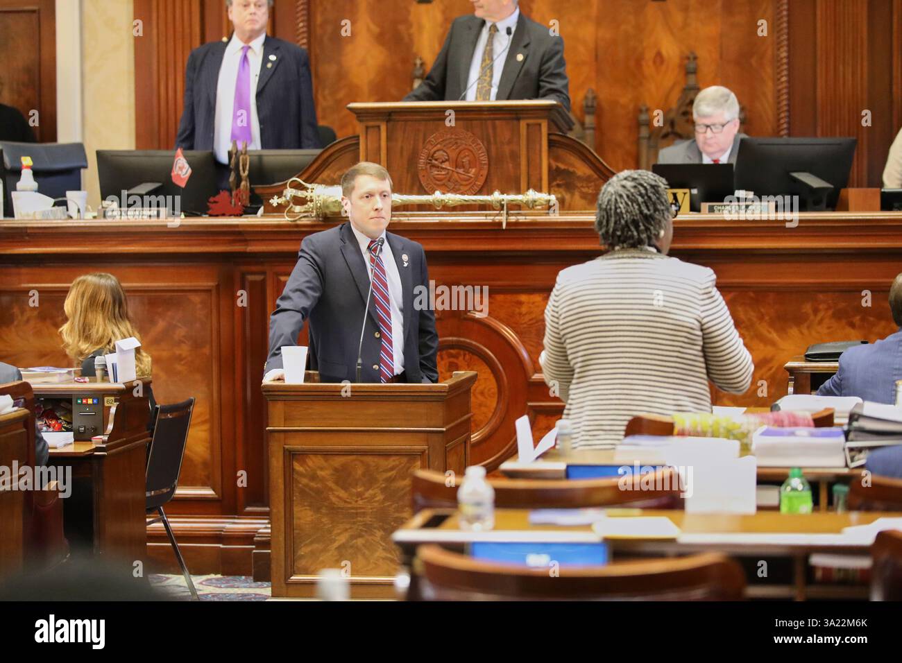 South Carolina Rep. Jordan Pace, R-Goose Creek, left, listens to a ...