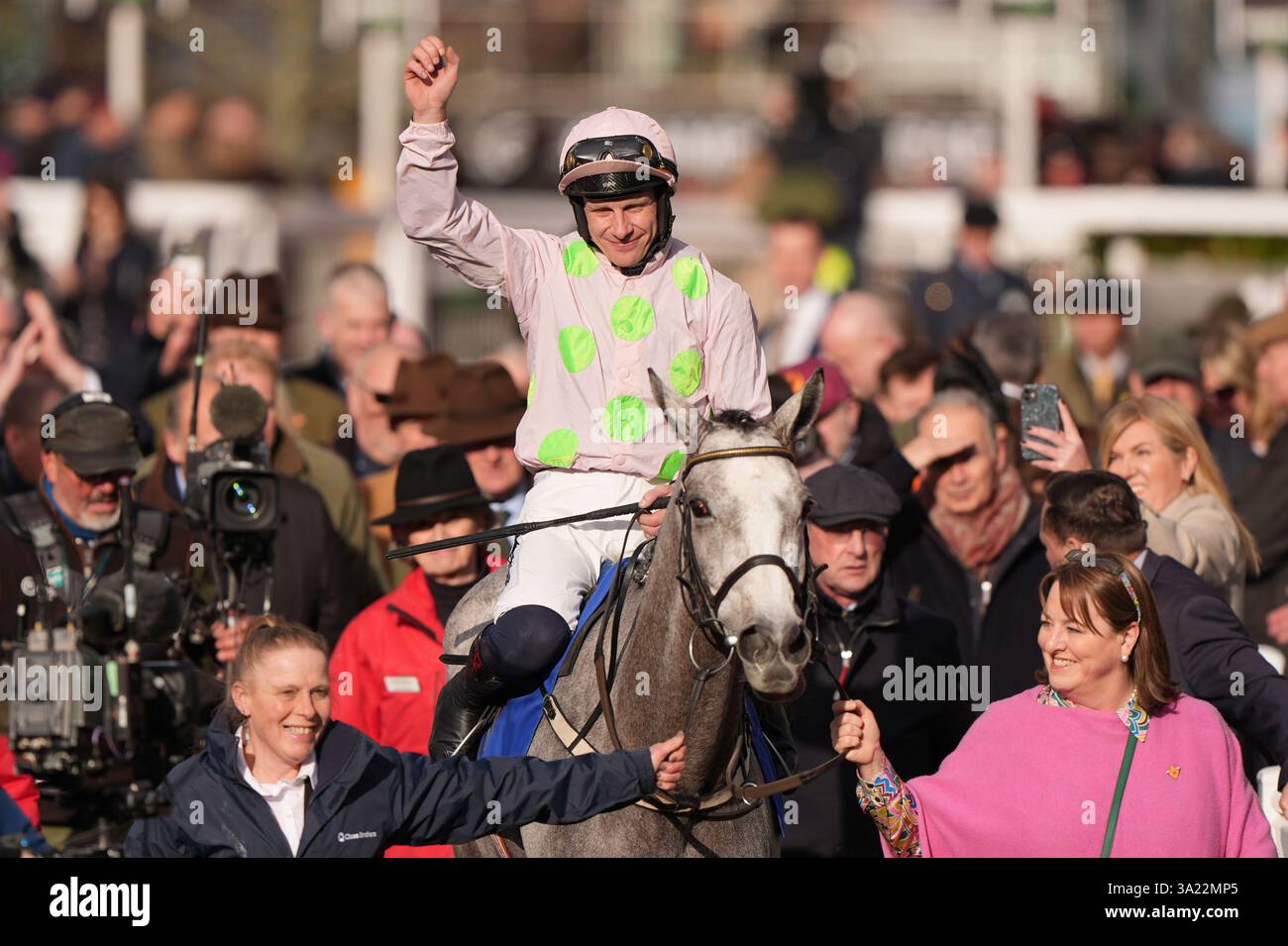 Jockey Paul Townend acknowledges the crowd as he makes his way into the ...