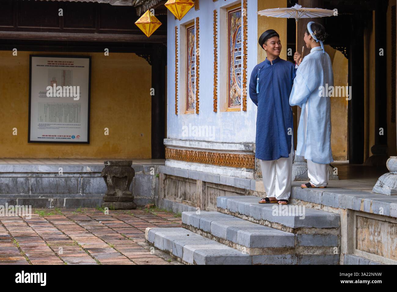 This is a view of people dressed in traditional Vietnamese clothing in ...