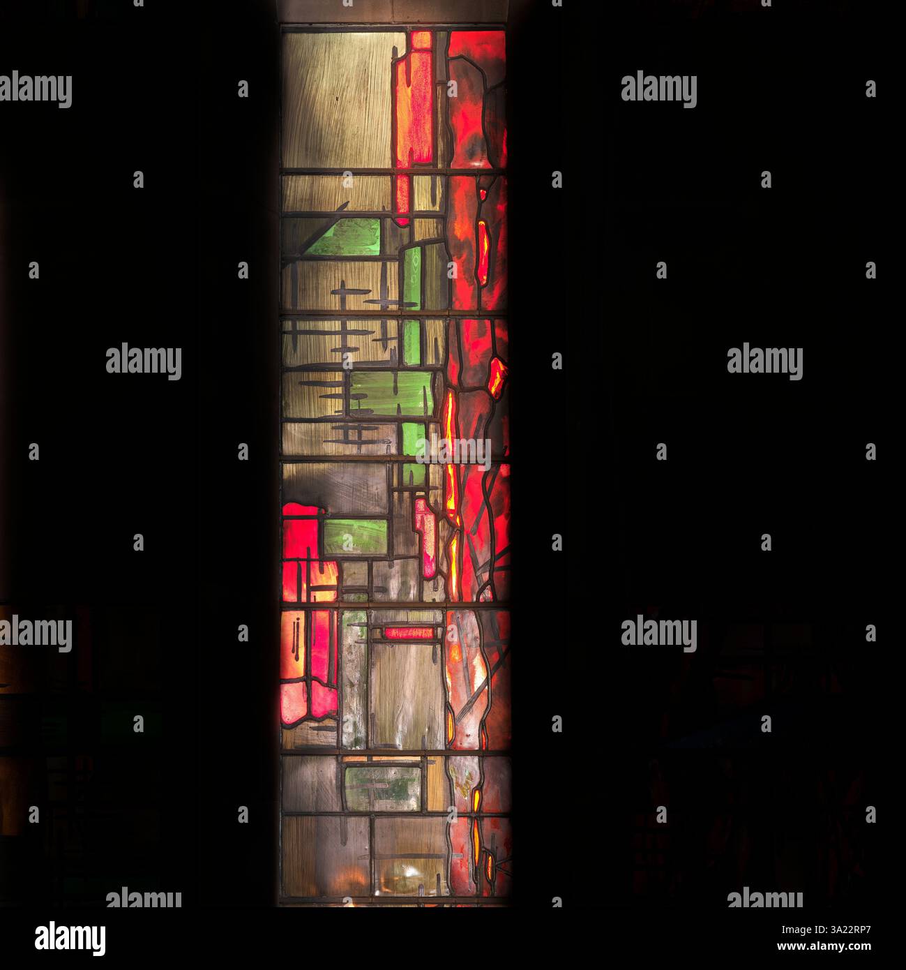 Stained glass window behind the baptismal font at the christian ...