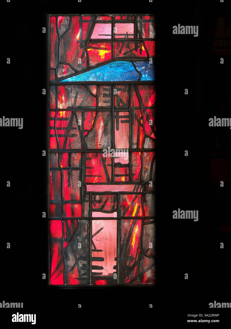 Stained glass window behind the baptismal font at the christian ...