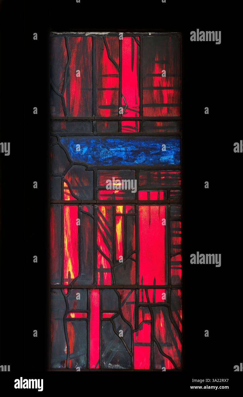 Stained glass window behind the baptismal font at the christian ...