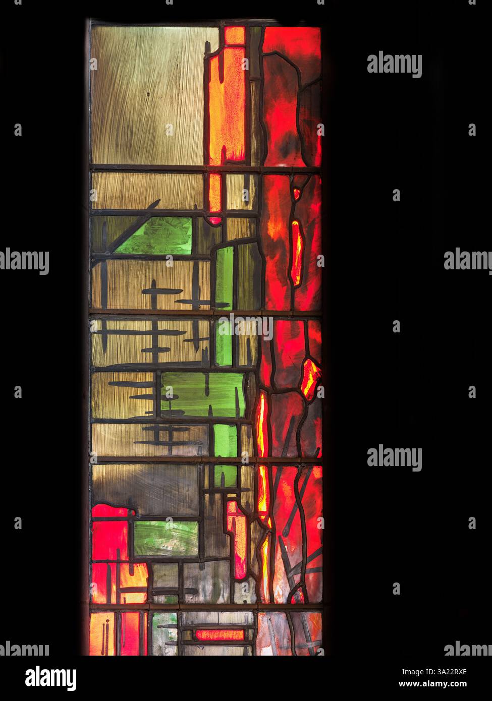 Stained glass window behind the baptismal font at the christian ...