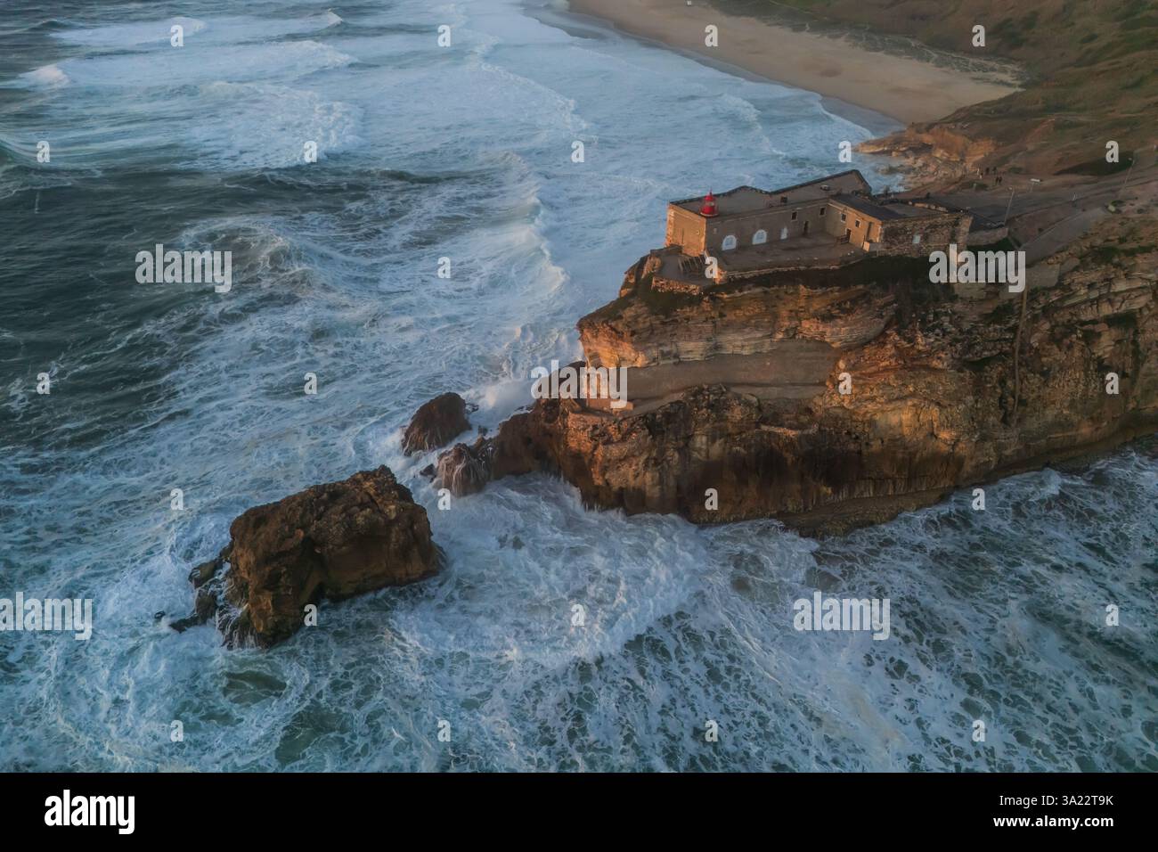 Aerial view of the The Nazare Lighthouse - Farol de Nazare -, where ...
