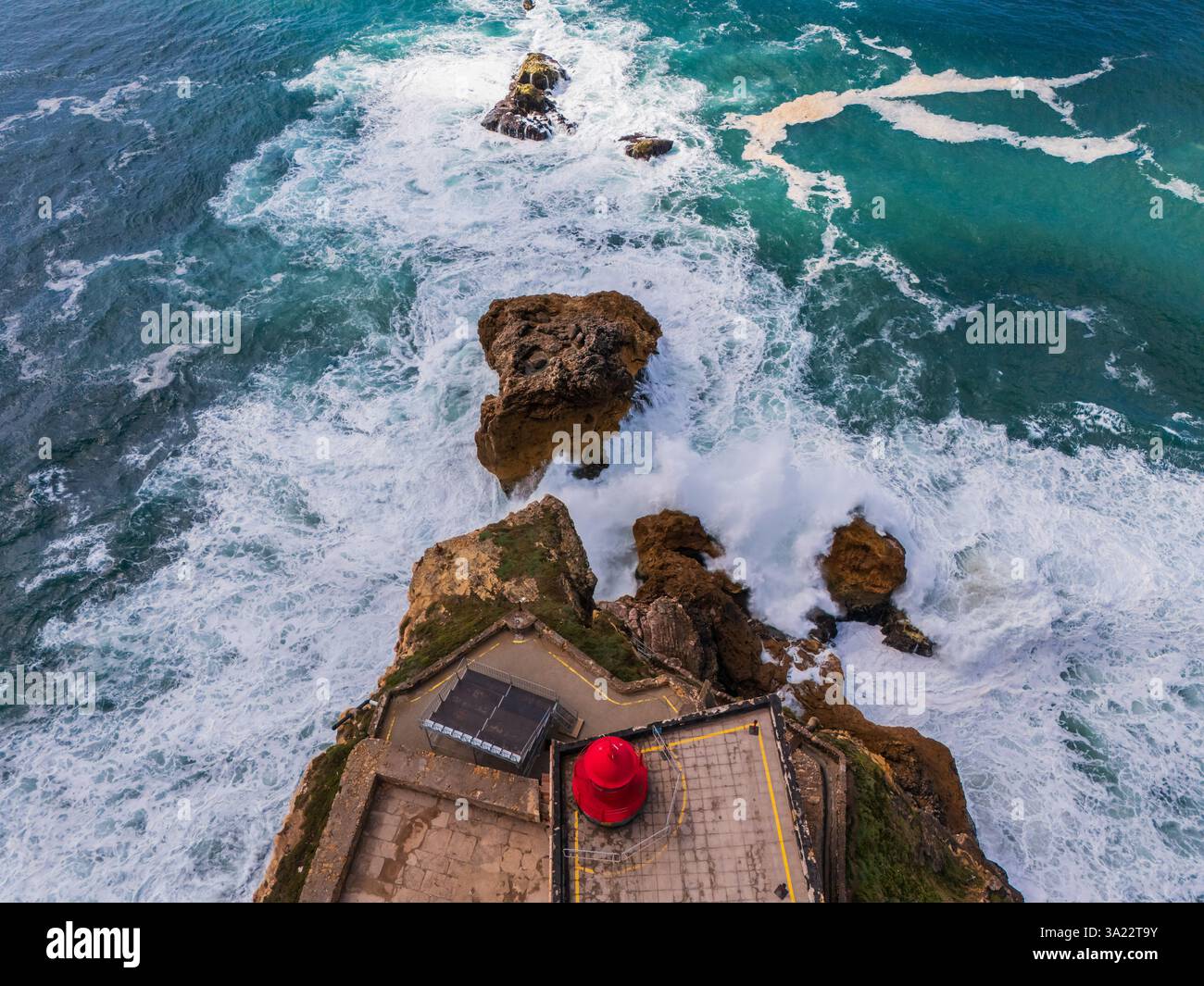 Aerial view of the The Nazare Lighthouse - Farol de Nazare -, where ...