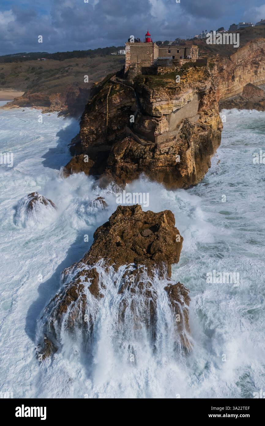Aerial view of the The Nazare Lighthouse - Farol de Nazare -, where ...