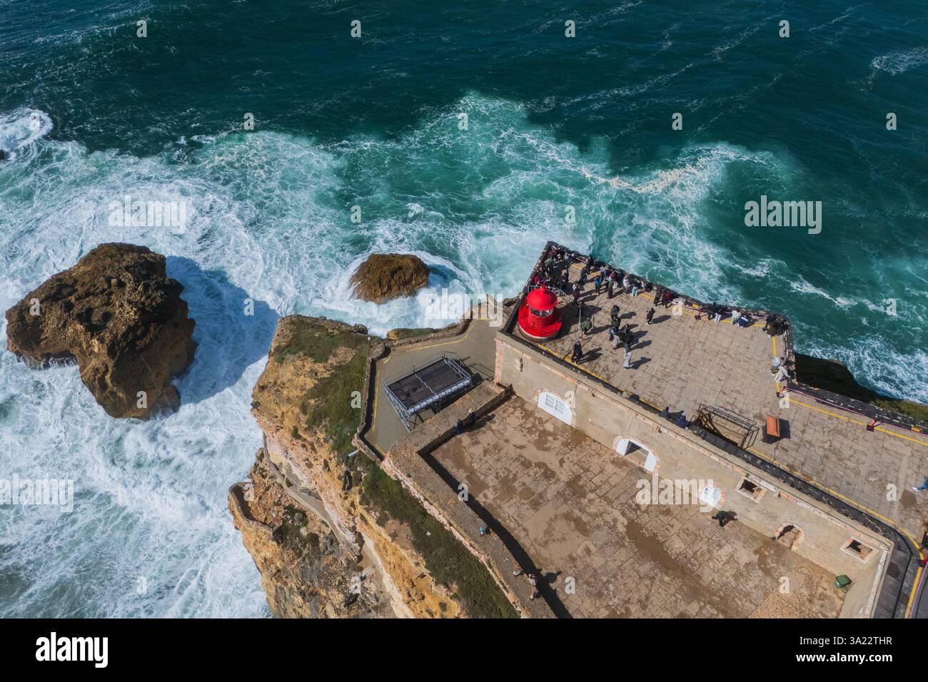 Aerial view of the The Nazare Lighthouse - Farol de Nazare -, where ...