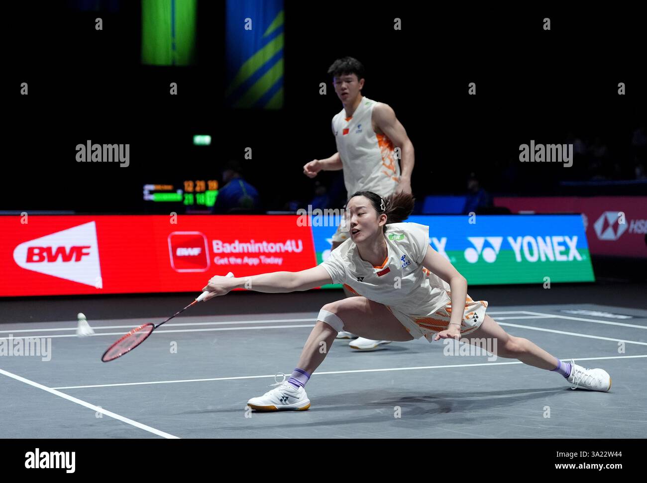 China's Yi Jun Zhu and Chi Zanhg during their mixed doubles match against France's Thom Gicquel ...