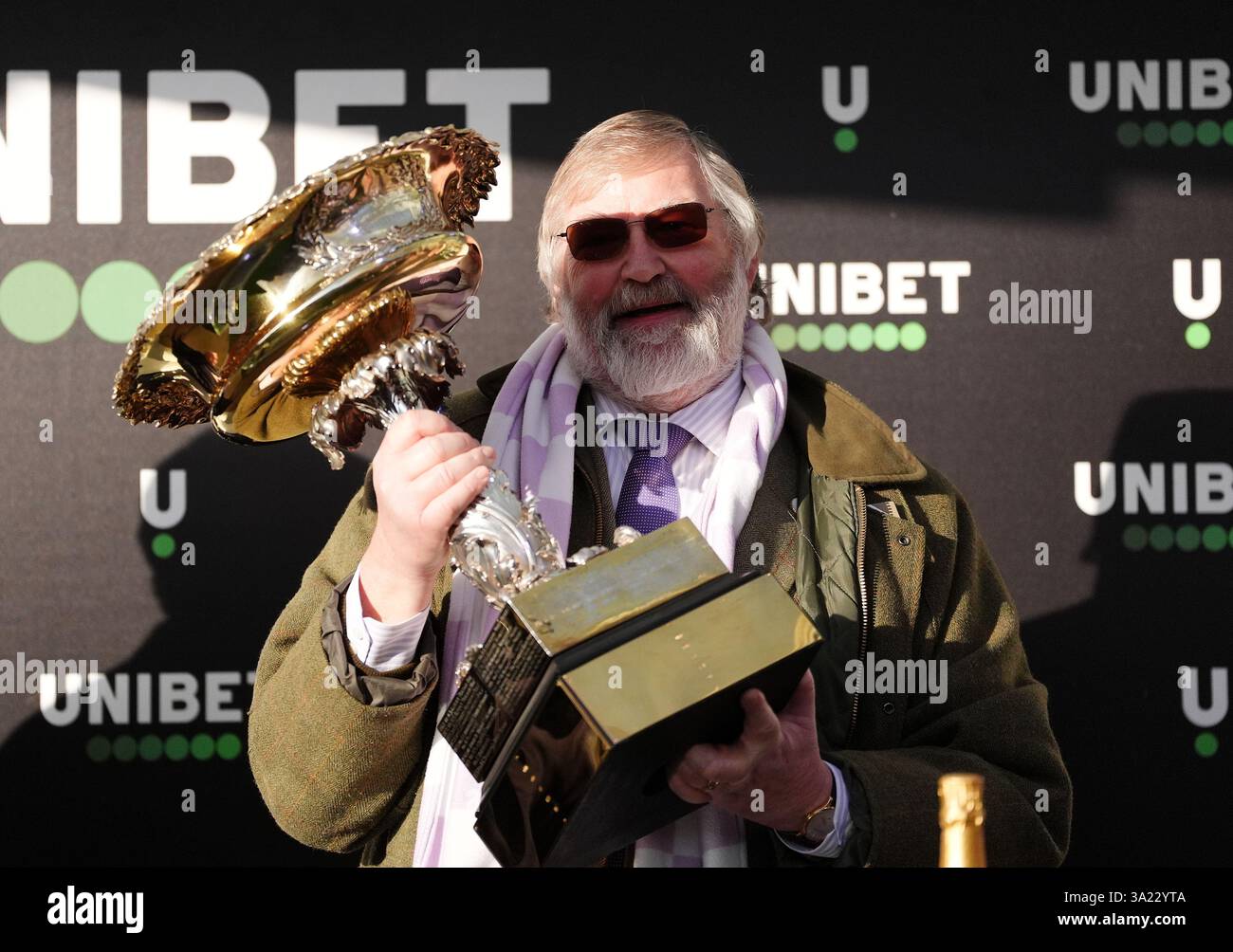 Ian Gosden, Owner of Golden Ace, celebrates with the Unibet Champion ...