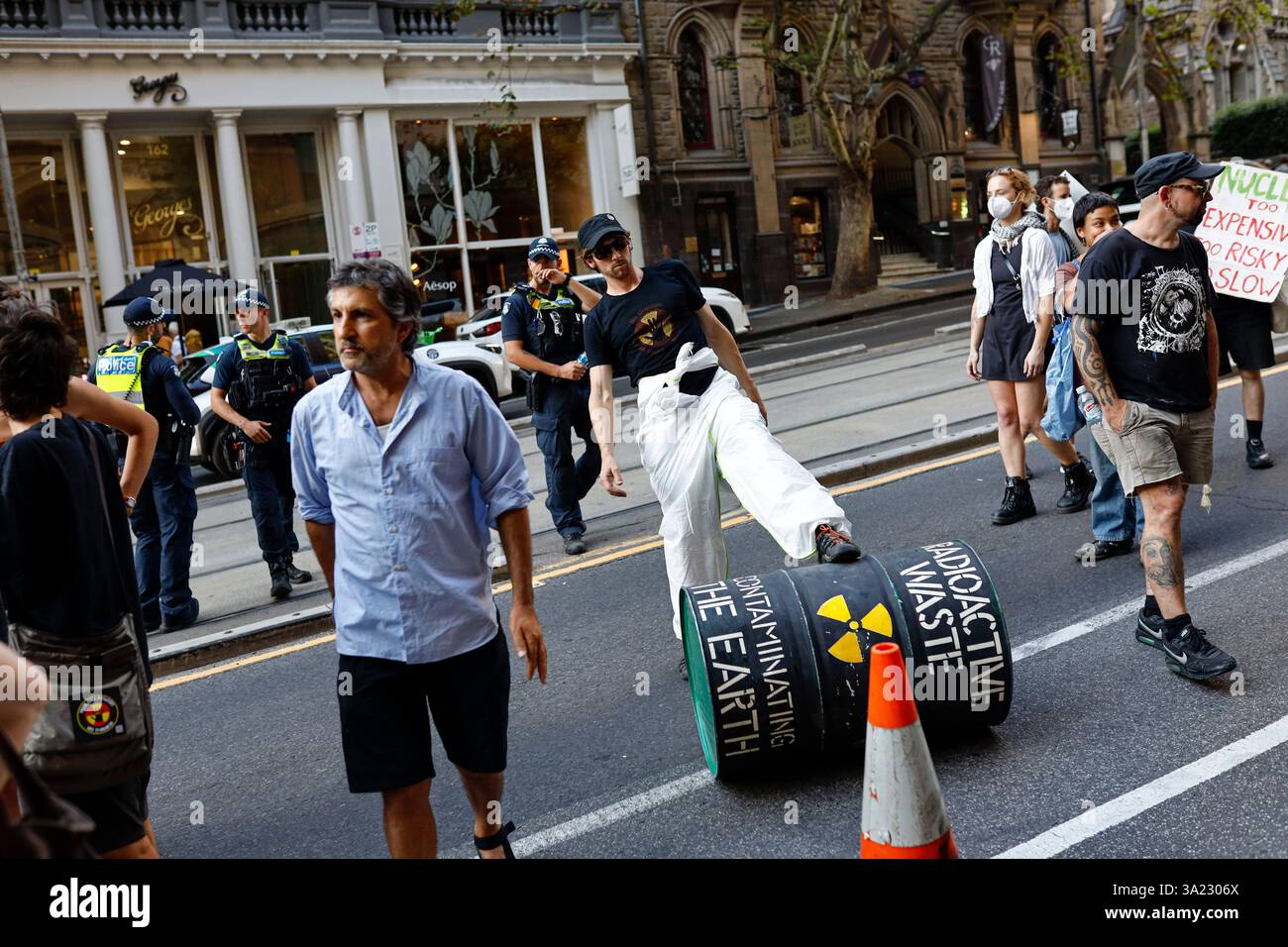 A protester rolls an empty oil tank during the rally. March 11 2025 ...
