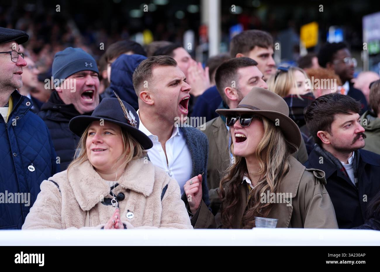 Racegoers watching the Unibet Champion Hurdle Challenge Trophy on day ...