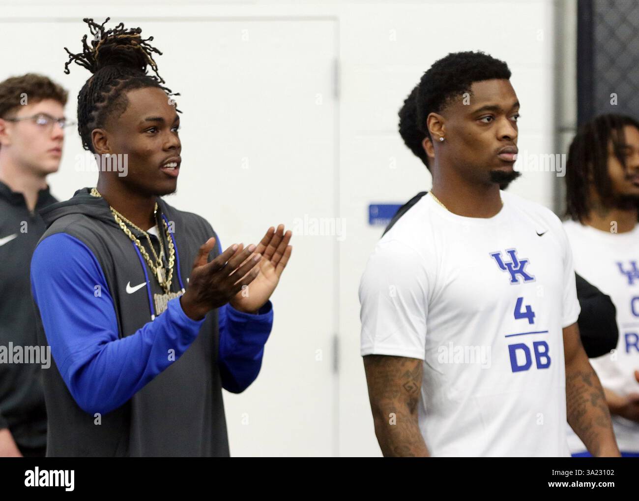 Kentucky's Maxwell Hairston, left, shows support for his teammates as ...