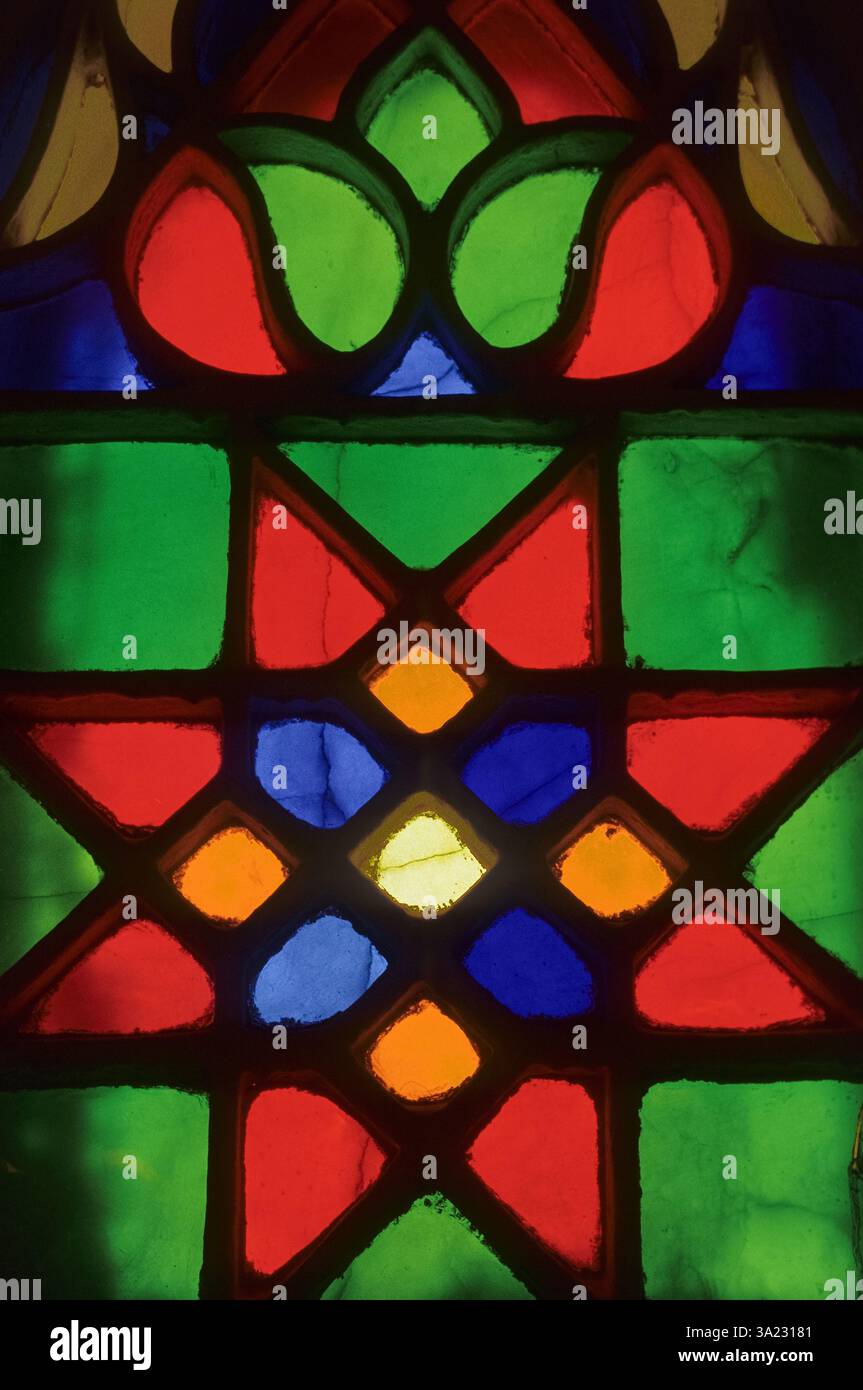 An eight-pointed star and other symmetrical spaces filled with red ...
