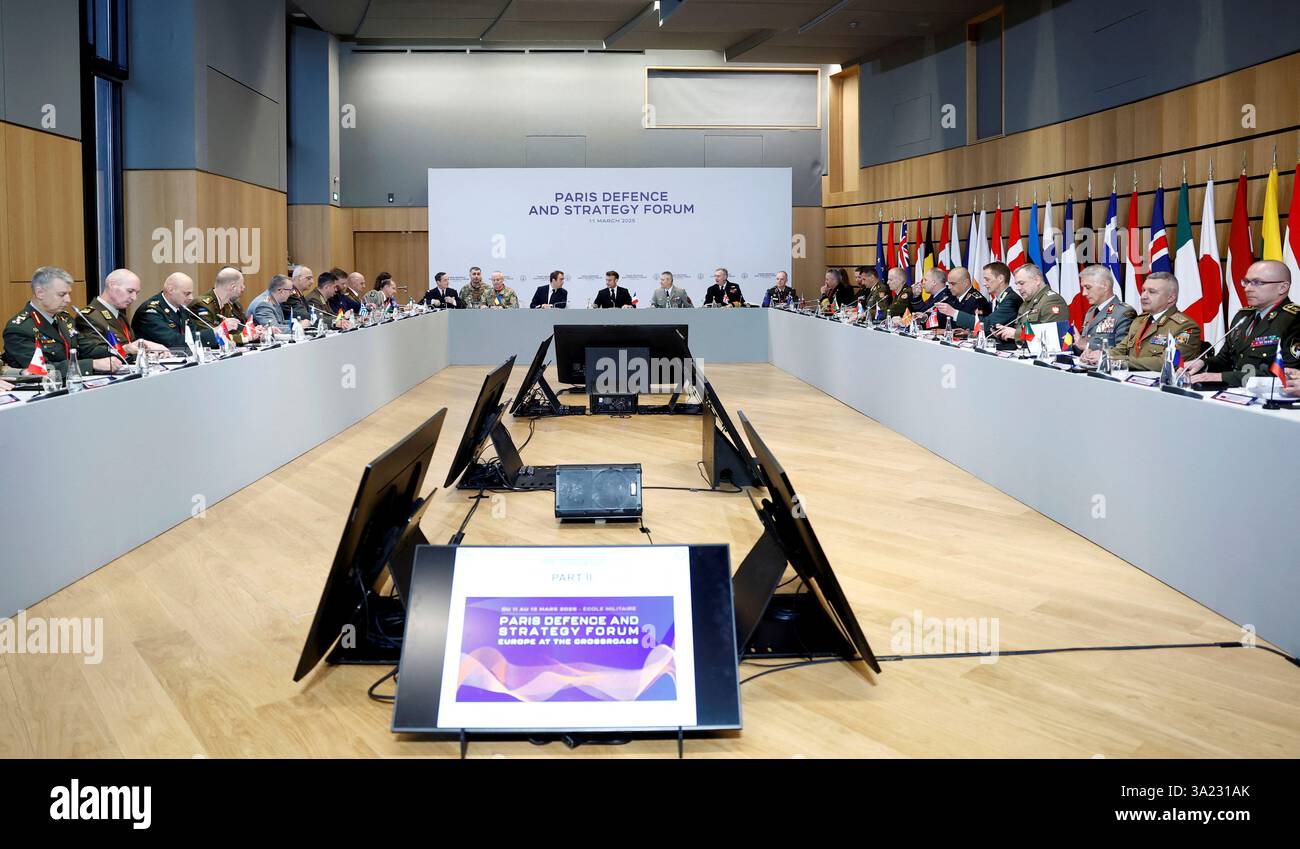 French President Emmanuel Macron, center, attends a meeting with the ...