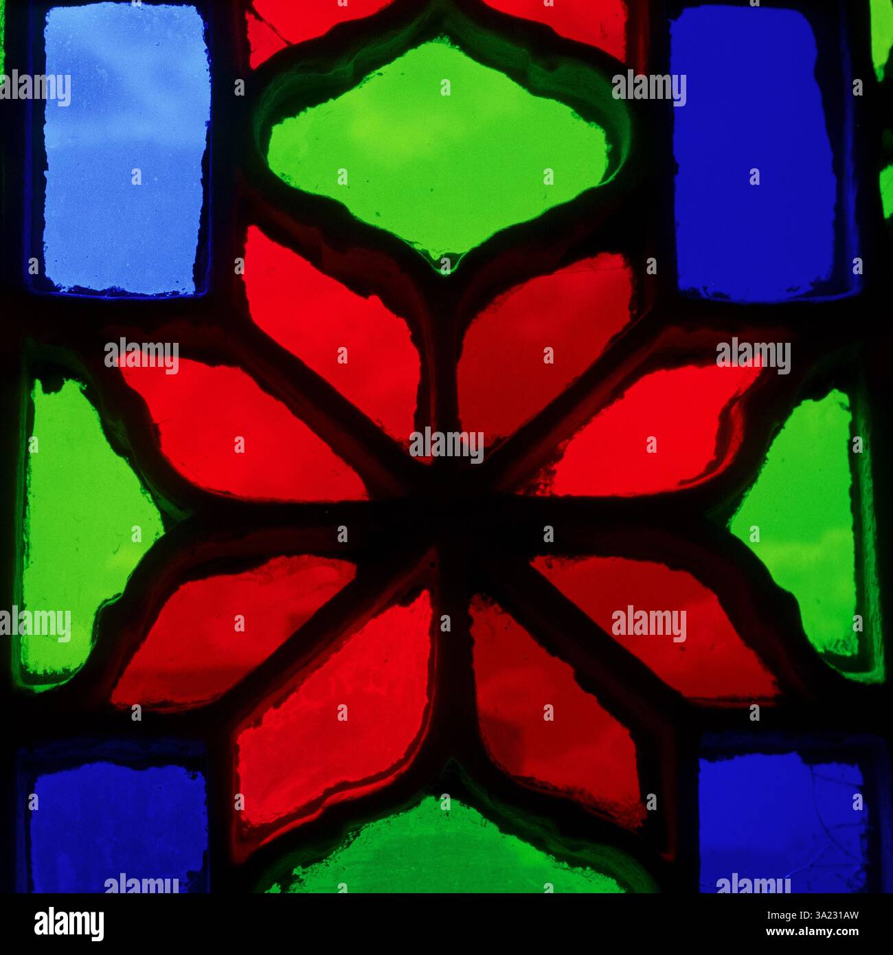 Radiant reds, blues and greens combine in this detail of a traditional ...