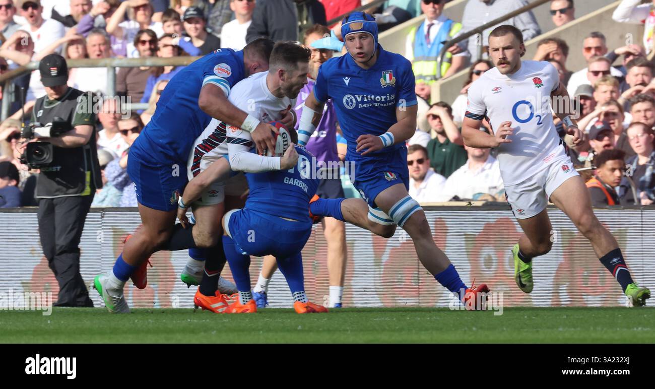 L-R Elliot Daly Ross Vincent and England's Ollie Sleightholme(Northampton Saints) in action ...