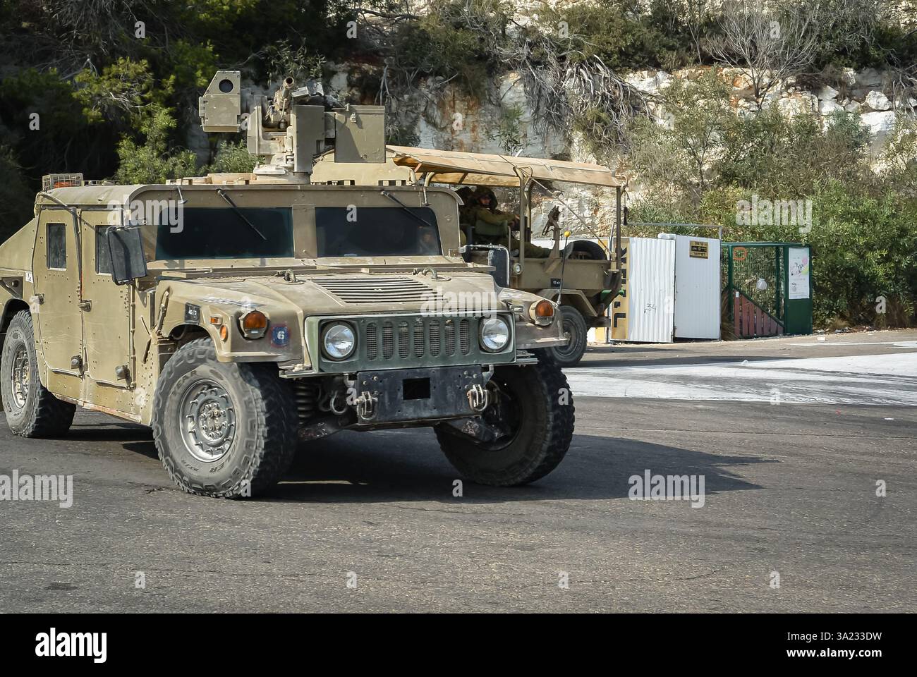 Vehicle military convoy on Lebanon and Israel border. Convoy of armored ...
