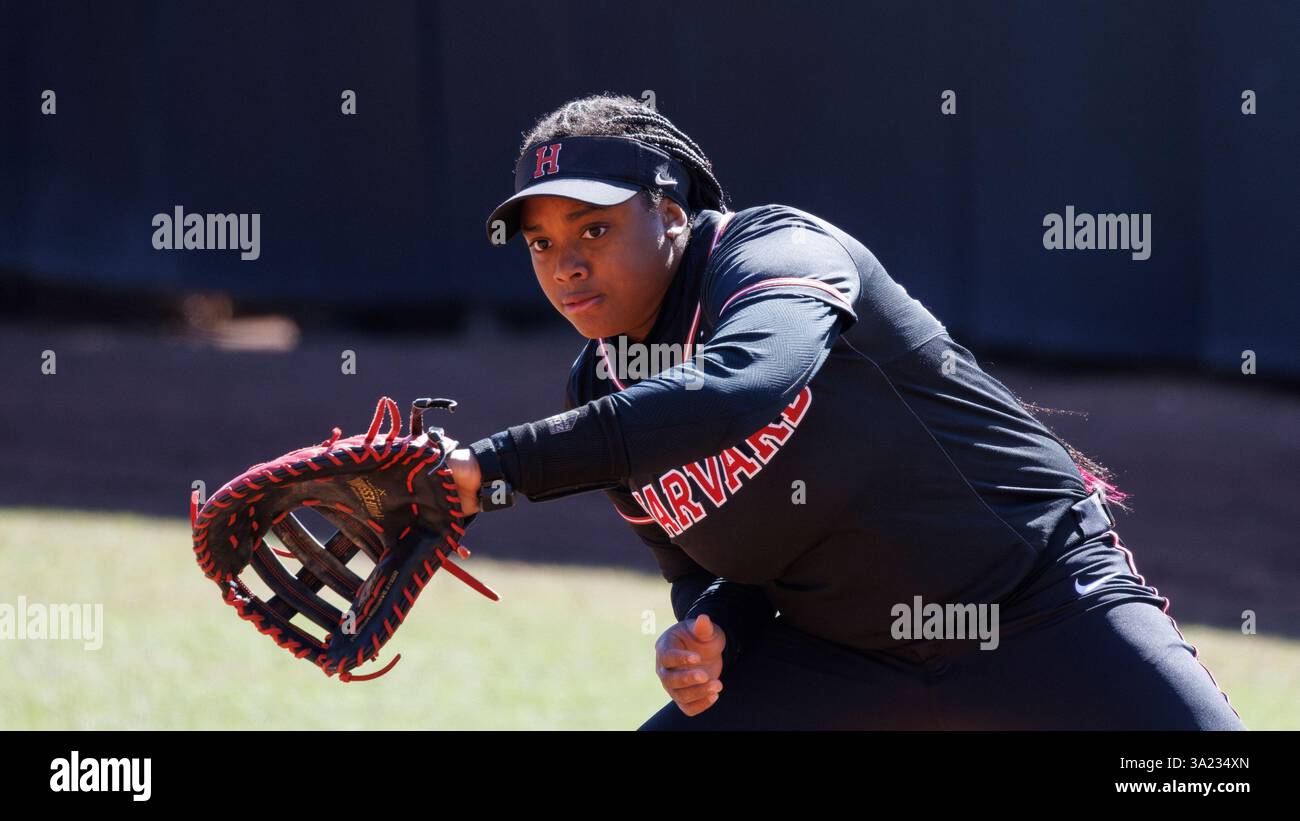 Harvard's Maya Douglas (26) makes a catch during an NCAA softball game ...