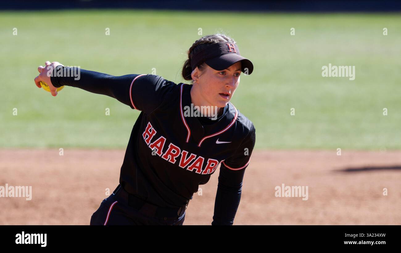 Harvard's Riley Flynn (5) pitches during an NCAA softball game on ...