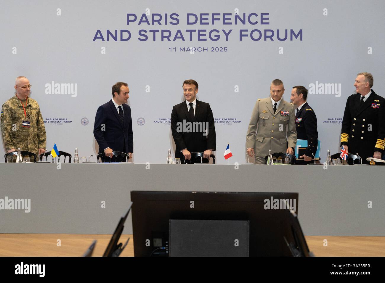 Paris, France. 11th Mar, 2025. French President Emmanuel Macron, reacts ...