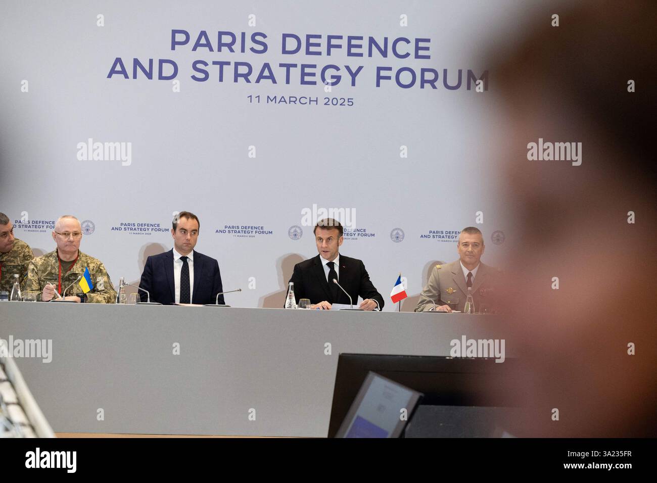 Paris, France. 11th Mar, 2025. French President Emmanuel Macron, reacts ...