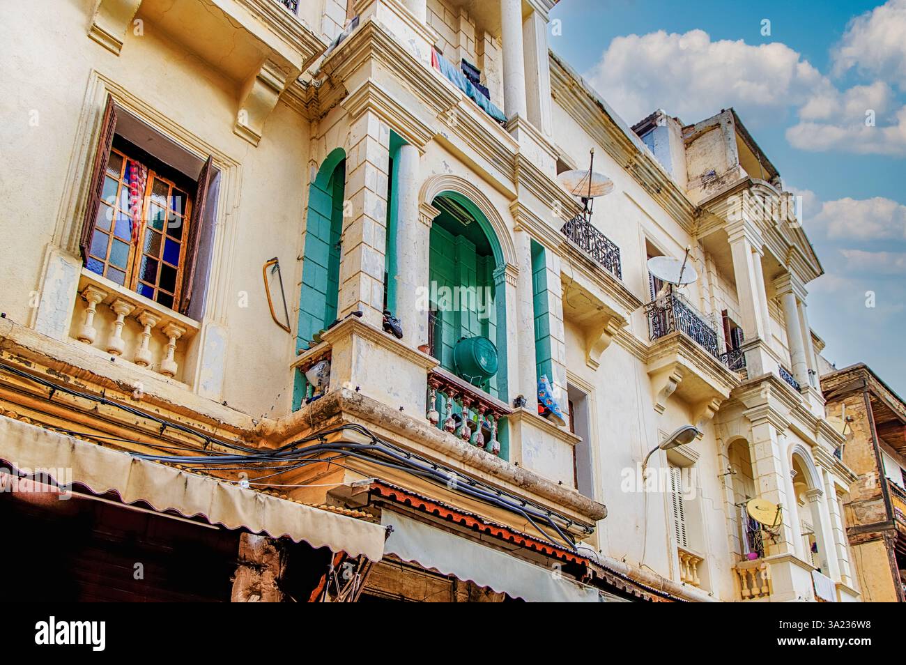 Houses of the Jewish quarter, at the Mellah street. Typical balconies ...