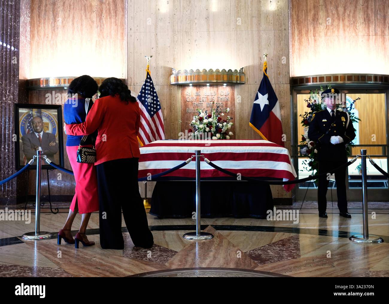 People pay their respects as the remains of U.S. Rep. Sylvester Turner ...