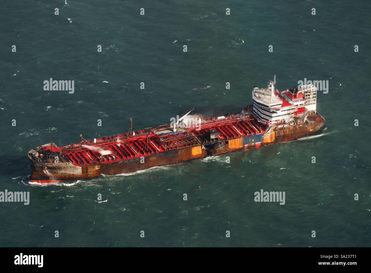 The damaged MV Stena Immaculate tanker is seen at anchor off the ...