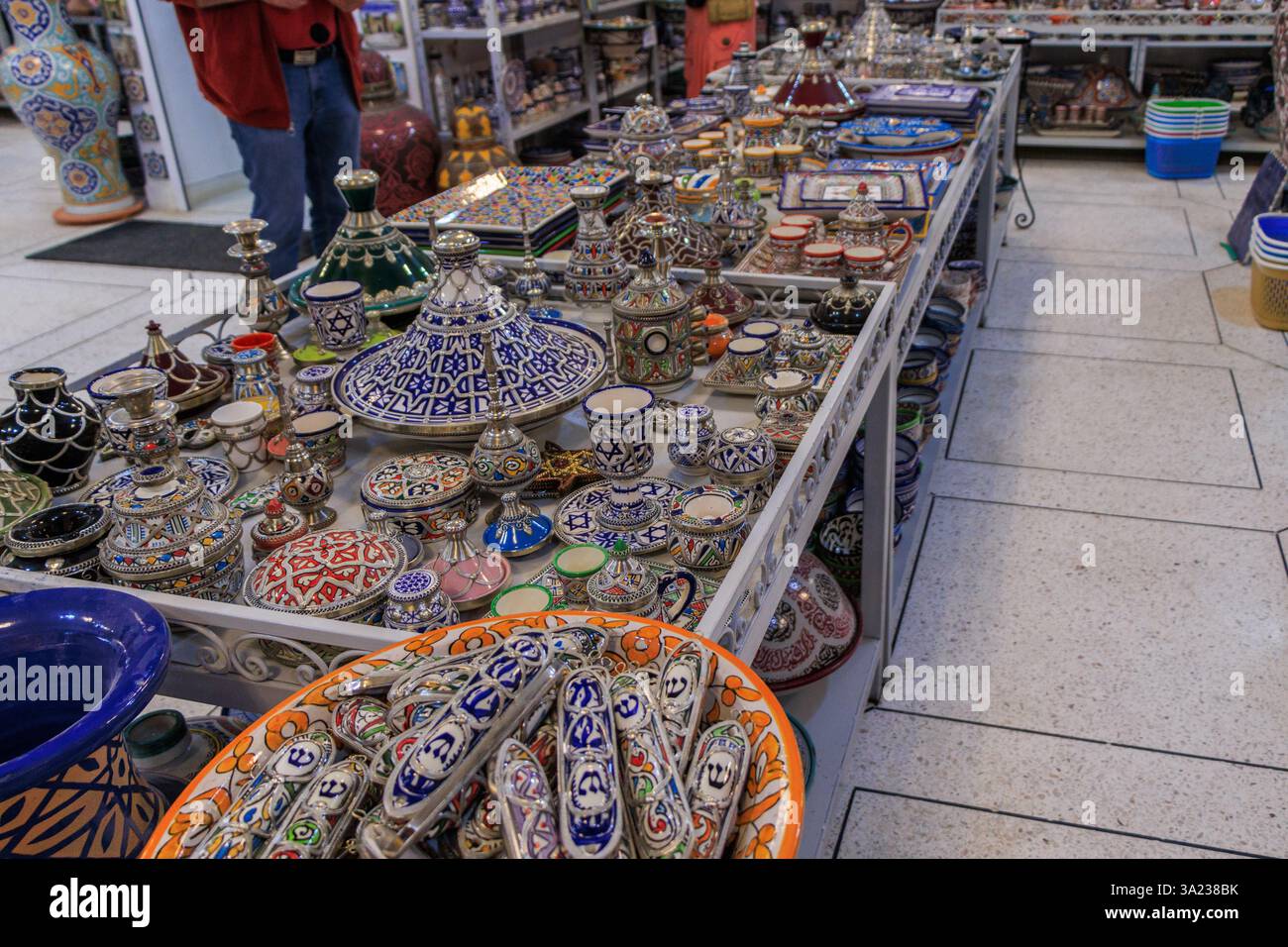 Jewish Craftsman painting and decorating ceramic products in pottery ...