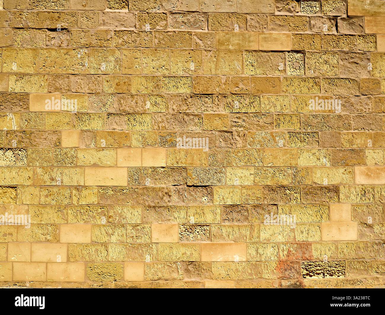 Background texture of a sandstone brick wall Stock Photo - Alamy