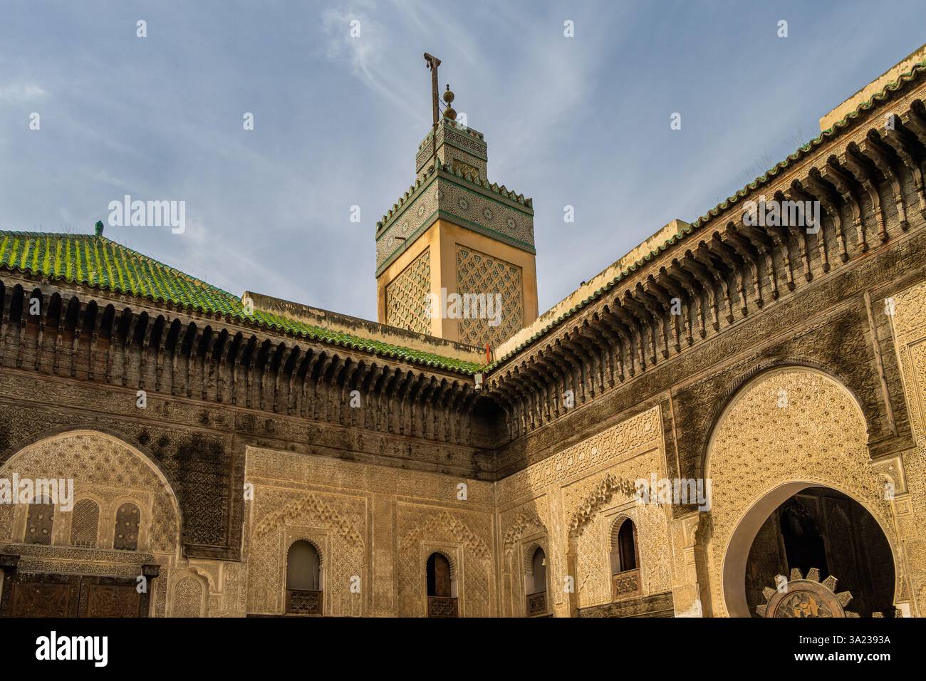 FES, MOROCCO. The minaret view and Inside interior of The Madrasa Bou ...