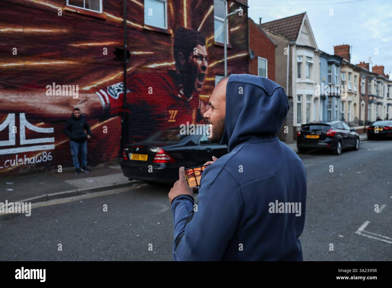 Fans pose for picture outside a mural of Steven Gerrard prior to the ...