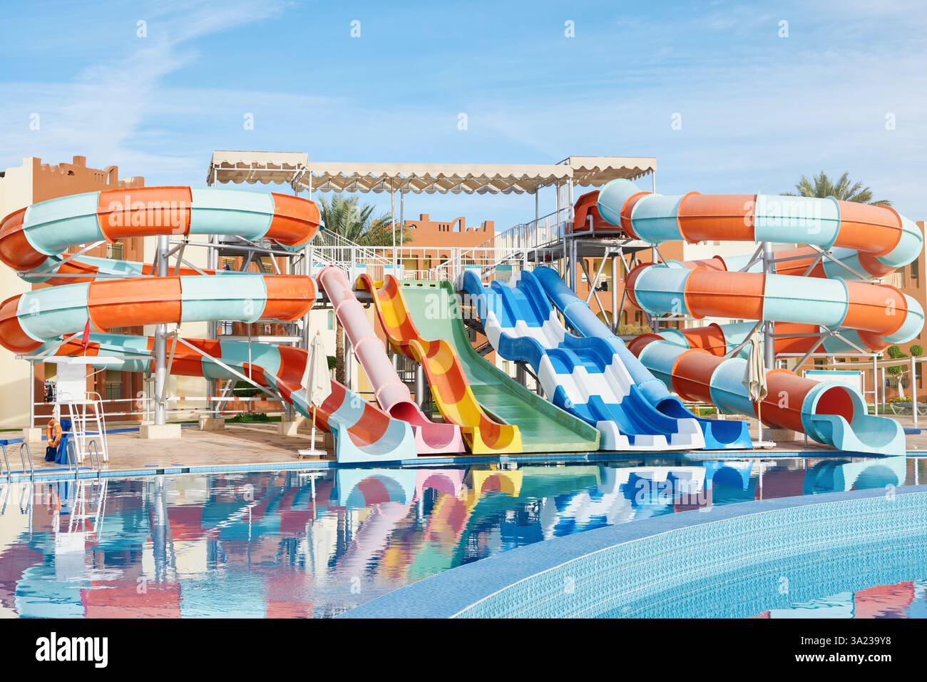 Water park with water colored flights, slides, splashes and pools at ...