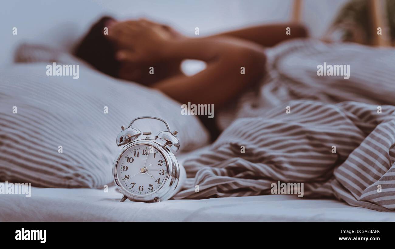 African american woman suffering from insomnia lying in bed without ...