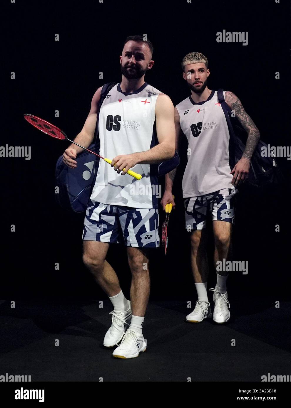 England's Ben Lane and Sean Vendy walk out ahead of their men's doubles ...