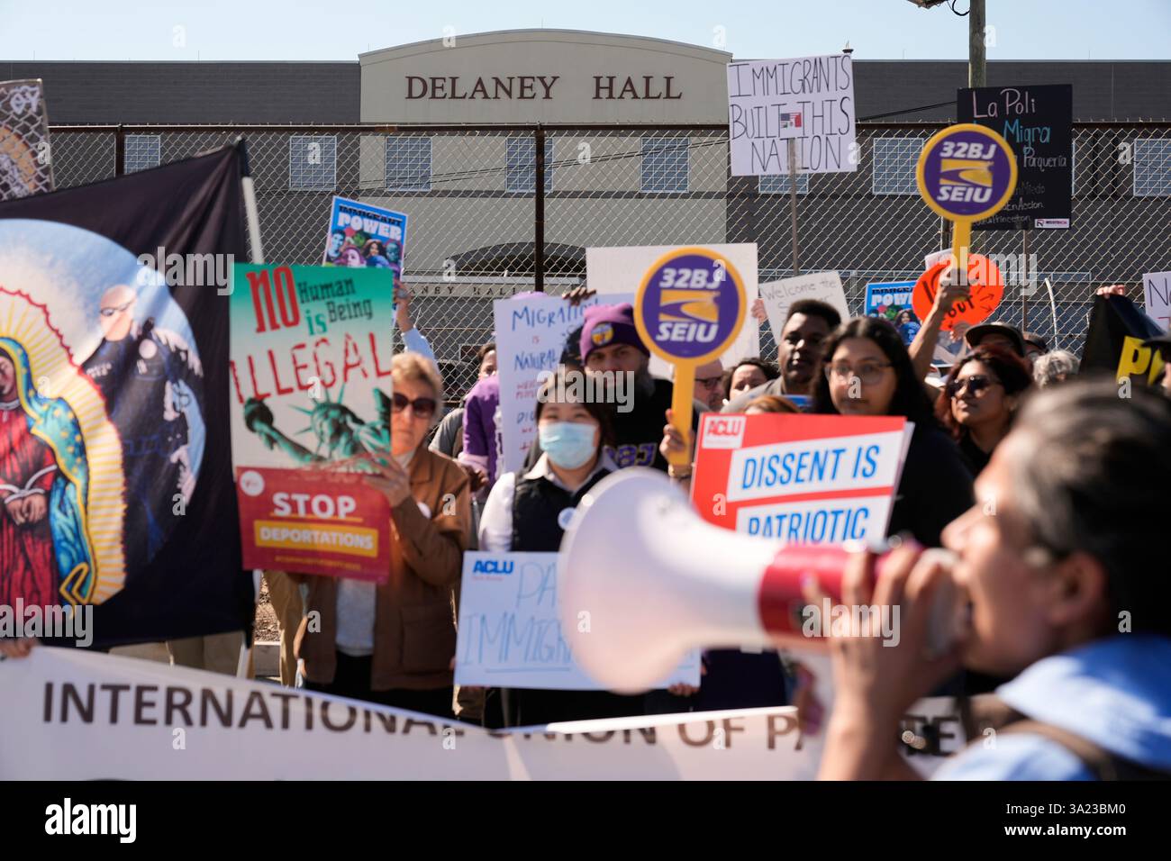 Protesters rally in front of of Delaney Hall, the proposed site of an ...