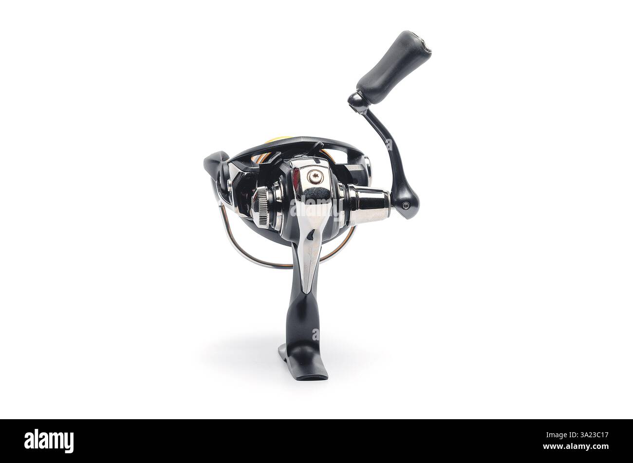 Spinning fishing reel with gold spool on white background Stock Photo ...