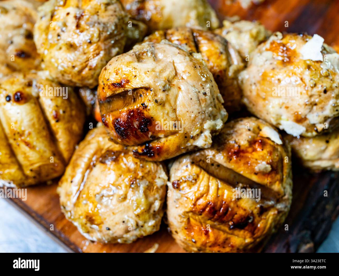 Mouthwatering grilled meatballs seasoned with herbs and spices are ...