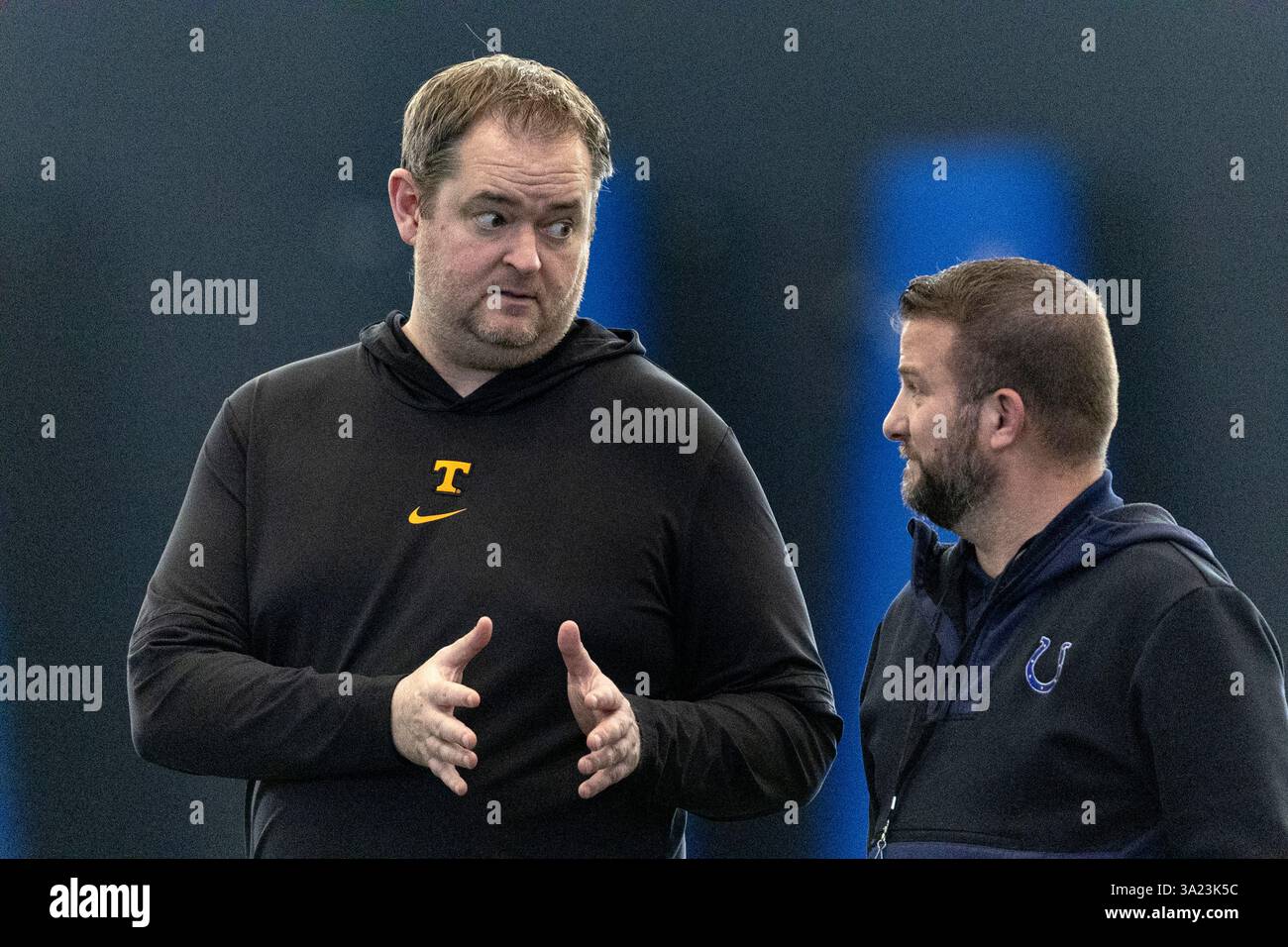 Tennessee head football coach Josh Heupel, left, talks with Jamie Moore ...
