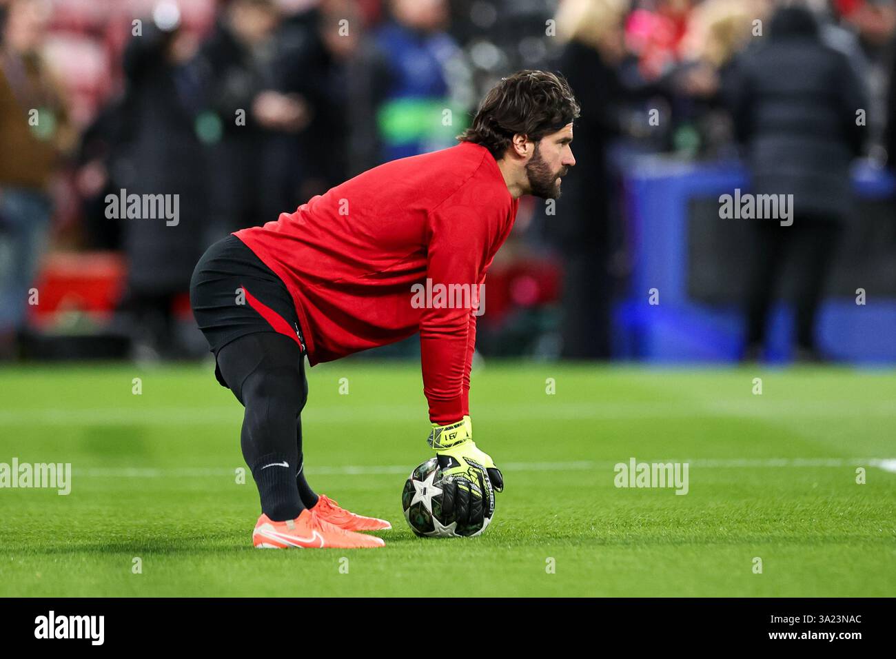Liverpool, UK. 11th Mar, 2025. Alisson Becker of Liverpool warms up ...