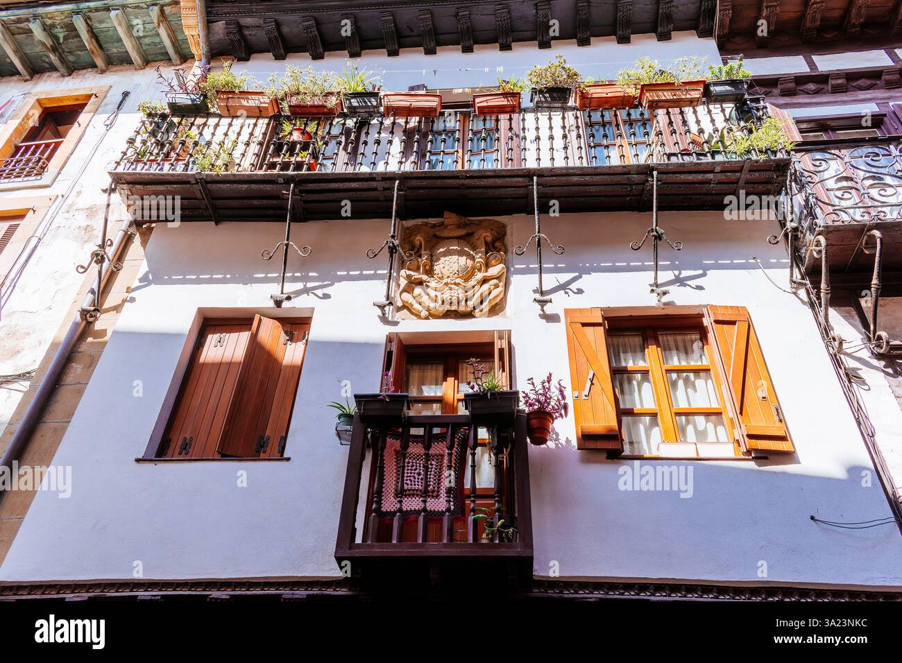 facade of a house with a coat of arms. Hondarribia, Gipuzkoa, Basque ...