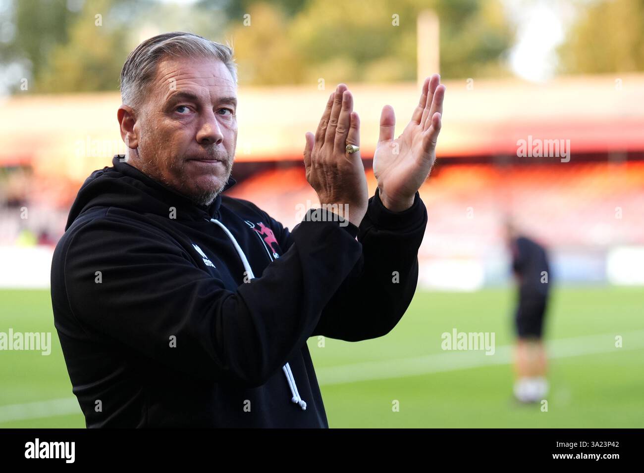 Crawley Town manager Scott Lindsey applauds the fans before the Bristol ...