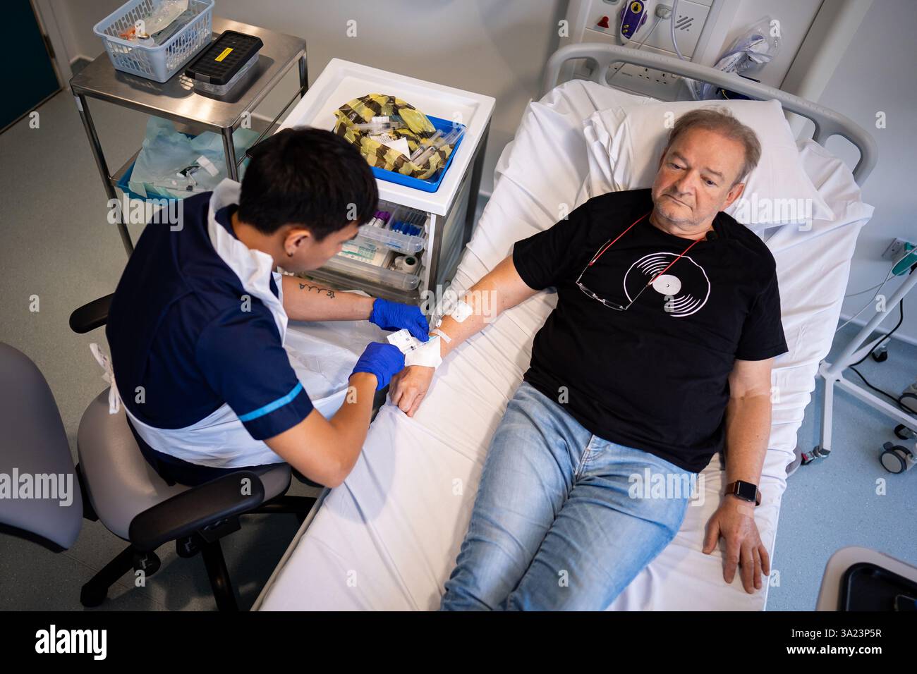 EMBARGOED TO 0001 FRIDAY AUGUST 23 Patient Janusz Racz receives an ...