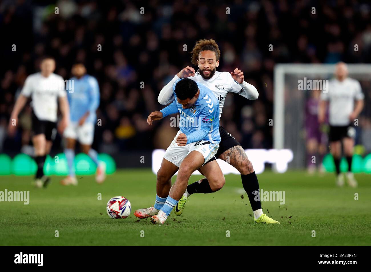 Coventry City's Milan van Ewijk and Derby County's Marcus Harness ...