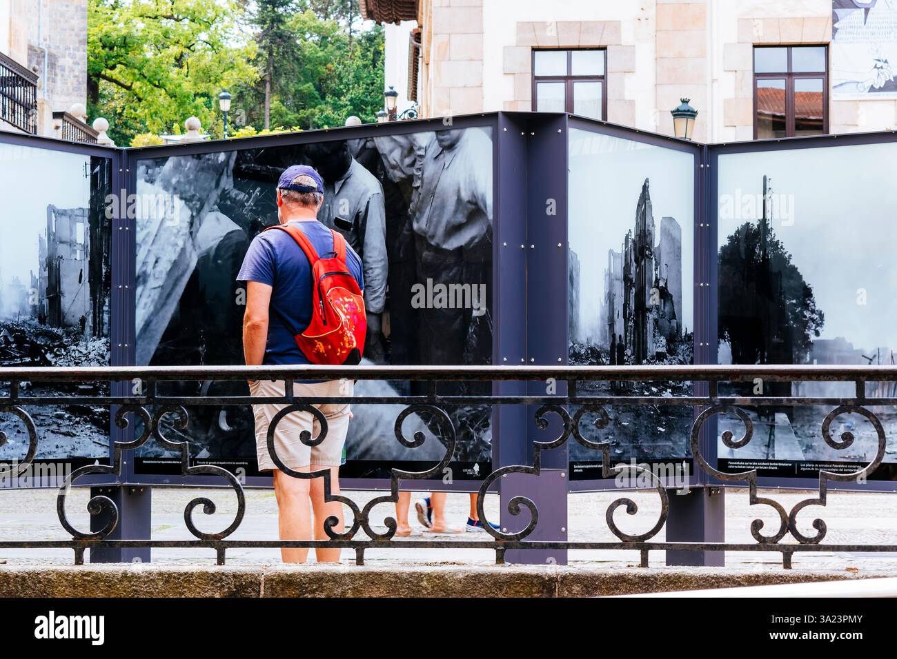 People viewing the photographic exhibition dedicated to the bombing of ...