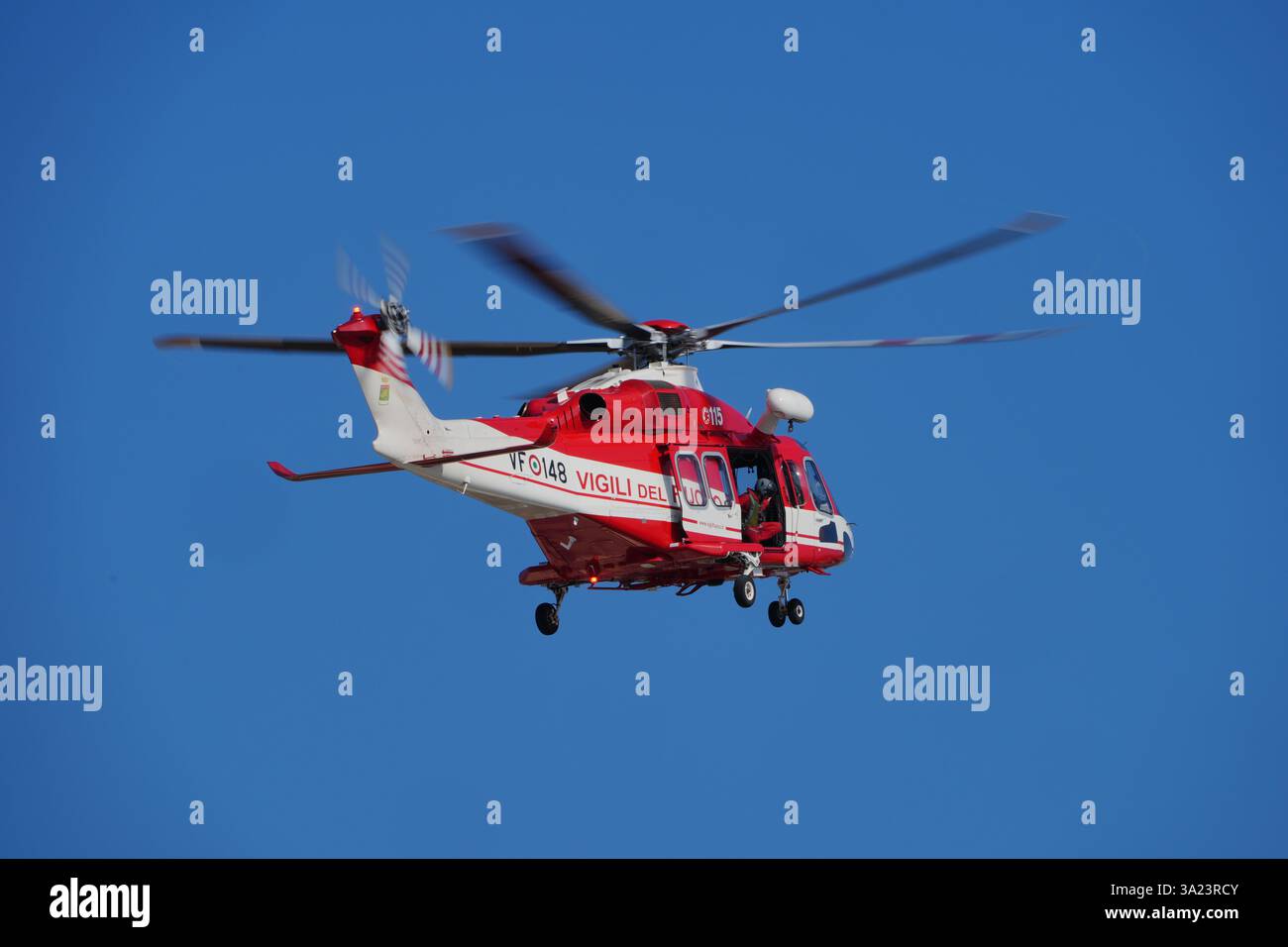 A helicopter from the Italian fire service in the air on the fifth day ...