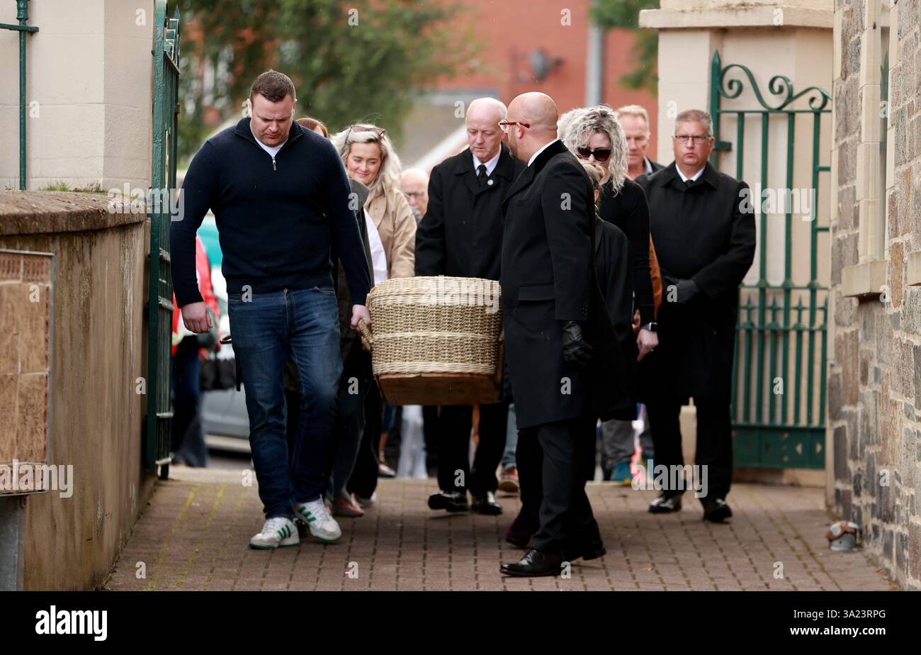 The coffin carrying Nell McCafferty is carried into St. Columba's ...