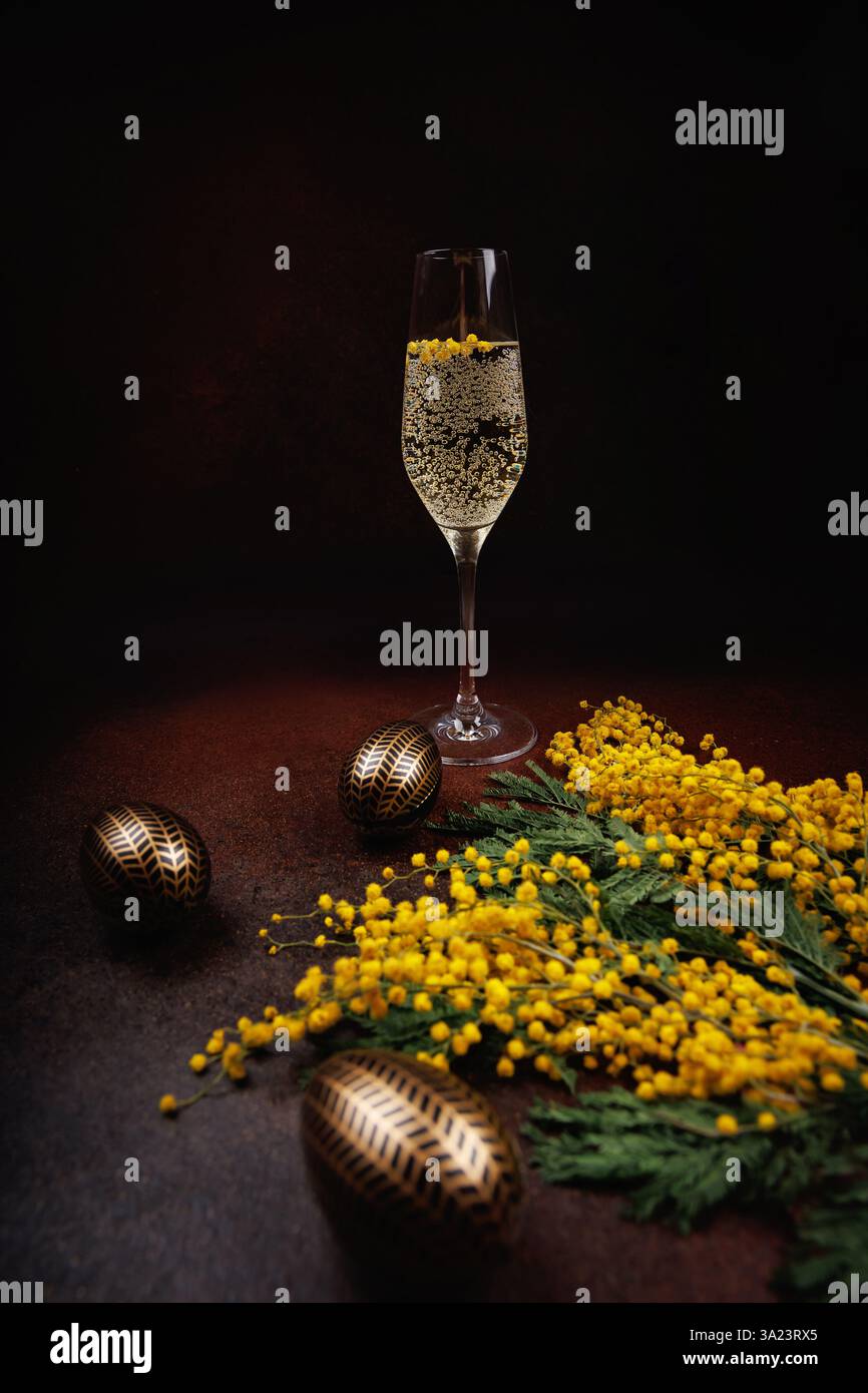 Festive Easter champagne with decorated eggs and mimosa Stock Photo - Alamy
