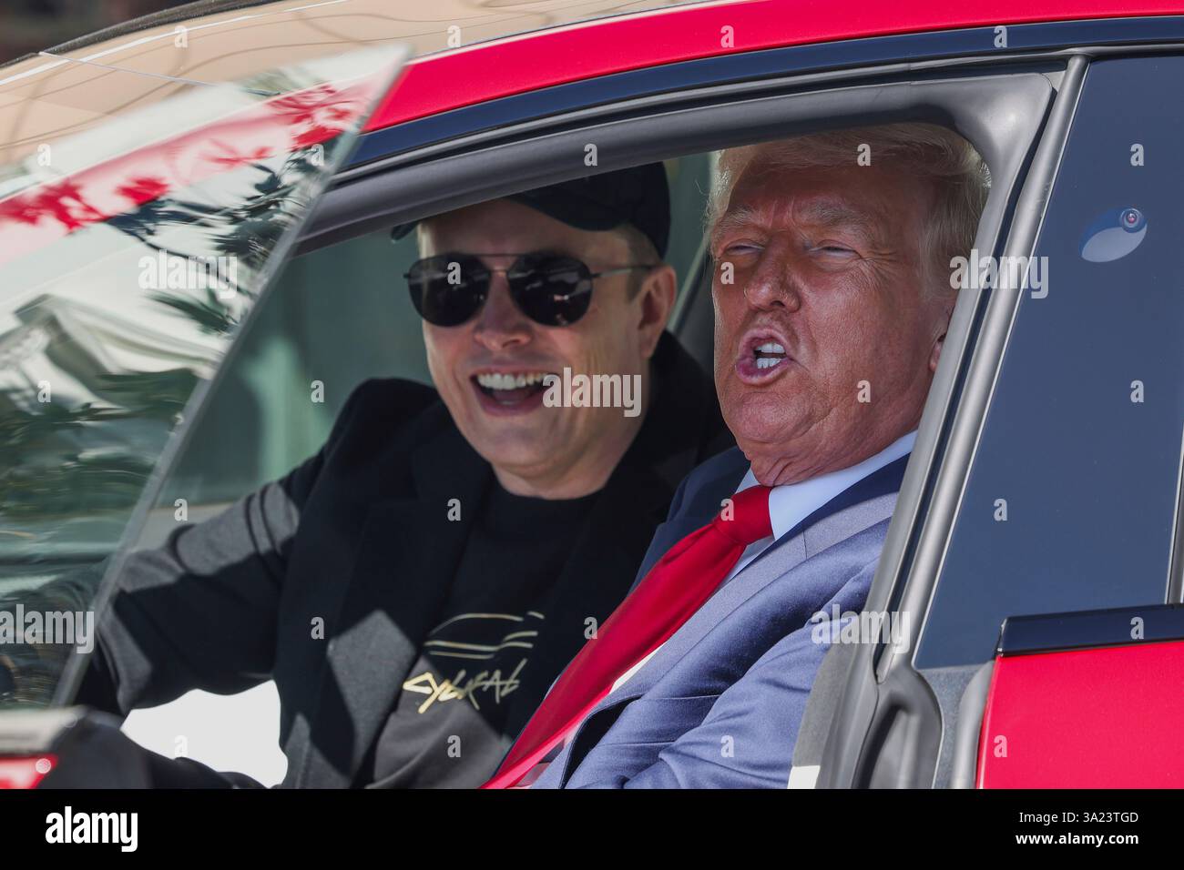 President Donald Trump and Tesla CEO Elon Musk speak to reporters as ...